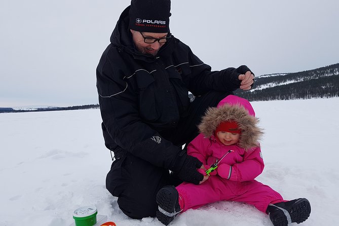 Ice fishing by car with hot beverages at Pyhä-Luosto - The Ice-Fishing Itself
