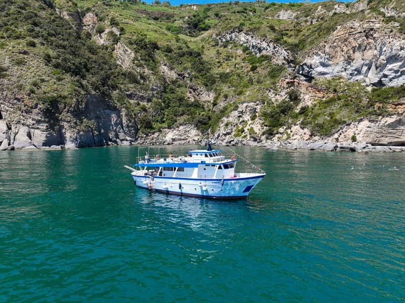 Ischia: Boat tour with swimming stops and lunch on board - Key Points
