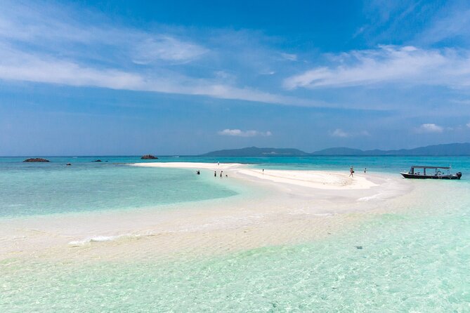 Ishigaki Phantom Island Snorkeling Taketomi Island Sightseeing - Exploring Taketomi Island
