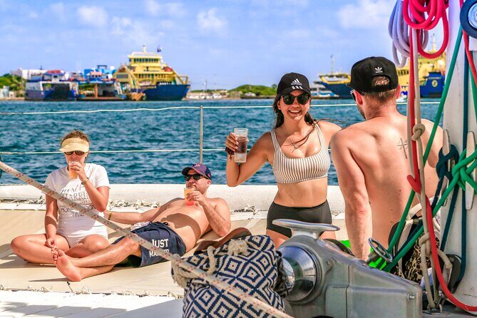 Isla Mujeres Catamaran Tour with Open Bar, Lunch and Snorkeling - The Sum Up