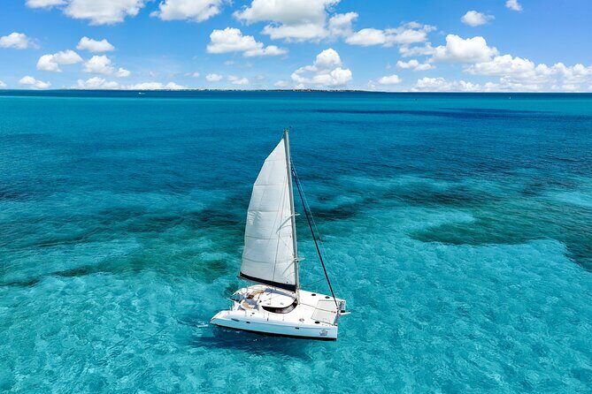 Isla Mujeres Catamaran Tour with Optional Pick-Up & Beach Club - Exploring Isla Mujeres Town