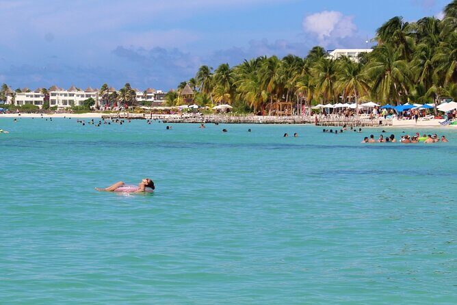 Isla Mujeres Catamaran Tour with Snorkeling at MUSA, Buffet Lunch & Open Bar - The Sum Up