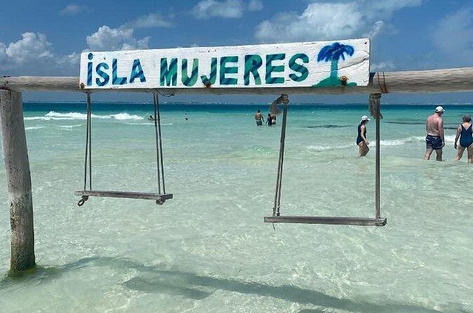 Isla Mujeres on luxury catamaran with snorkel, open bar and lunch - Summary