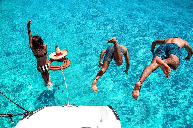 Isla Mujeres Tour on Catamaran with Snorkel, Open Bar, Buffet & Beach club - Who Should Consider This Tour?