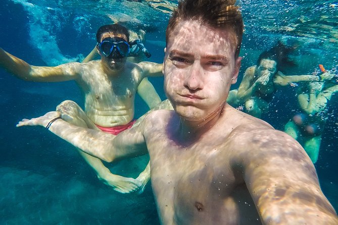 Island Hopping: Santorini Catamaran Charter Cruise With a Skipper - Pricing and Group Options