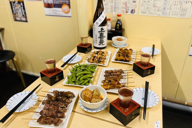 Japanese Food Experience Night Tour in Ueno - Discovering the Flavors of Ramen, Sashimi, and Yakitori