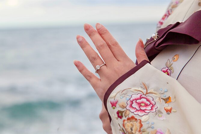 [Jeju] Hanbok Private guide tour & photo session in beautiful Yongduam rock, - The Sum Up