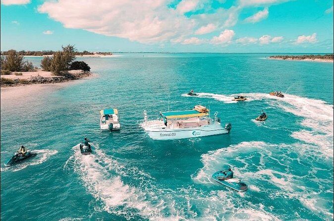 Jet Skiing around La famille ship and smaller pristine cays - The Cancellation Policy and Booking Tips