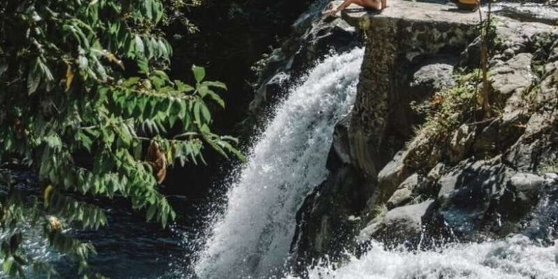 Jumping Sliding at Aling- Aling Waterfall and Handara Gate - Exploring Bali’s Waterfalls and Iconic Gate: A Practical Review