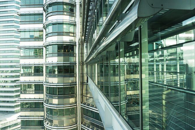 Kuala Lumpur City Tour with Petronas Twin Towers Entrance - Authentic Experiences and Practical Tips