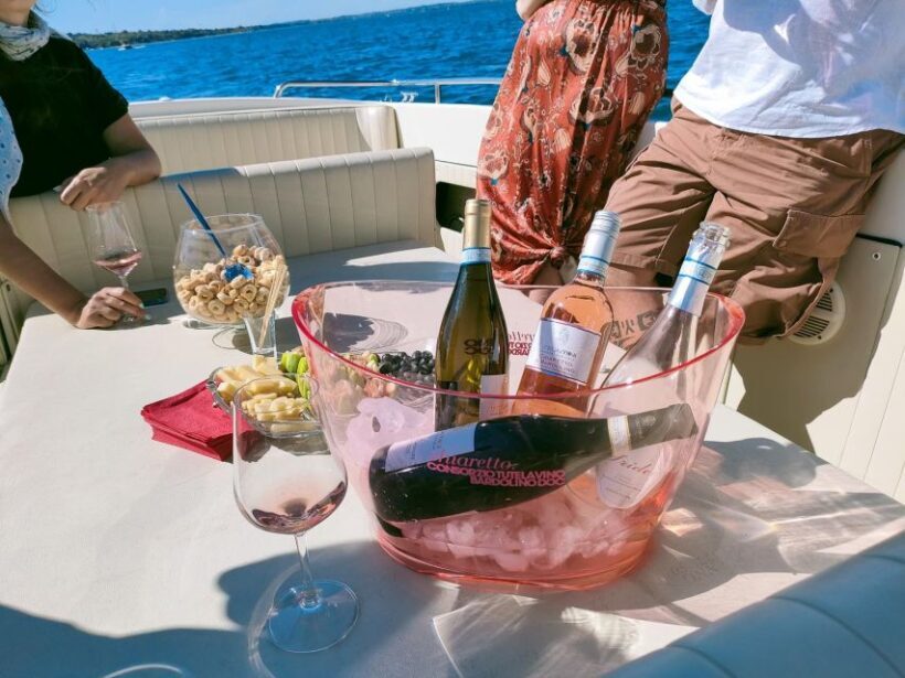 Lazise: Sunset Cruise with Wine aperitif on lake Garda - The Sum Up