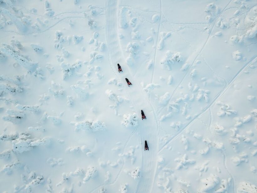 Levi: Snowmobile Safari with Ice Fishing and Outdoor Lunch - An Authentic Arctic Adventure in Levi