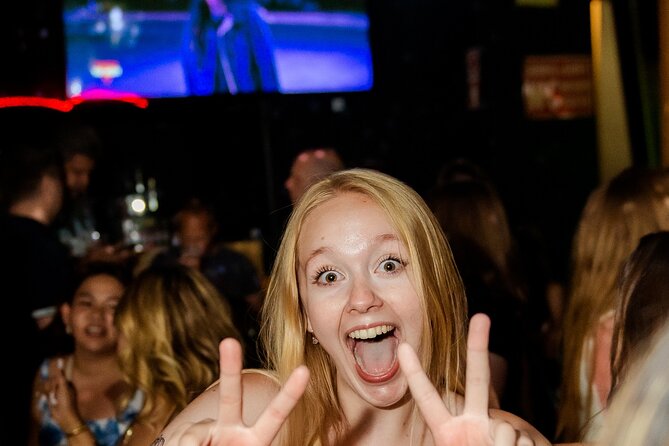 Lisbon Pink Street Pubcrawl: 1h Open Bar, Shots,VIP Club Entry - Pricing and Upgrade Options