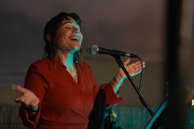 Lisbon: Rooftop Wine Tasting with Live Traditional Fado - Key Points