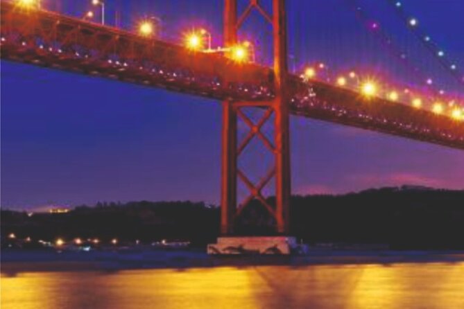 Lisbon Sail Cruise at Night With Wine - Enjoy a Complimentary Glass of Portuguese Wine