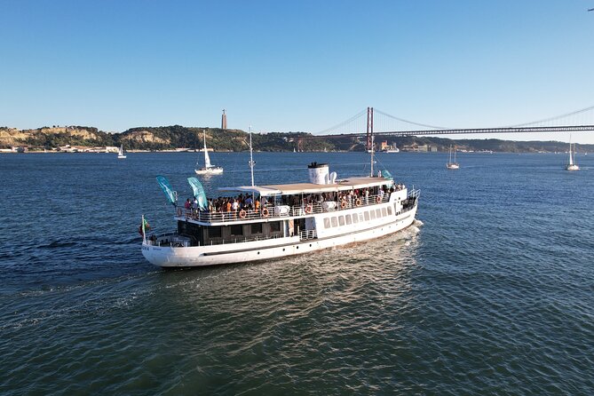 Lisbon: Sunset on Board With Music & Drinks - Key Points