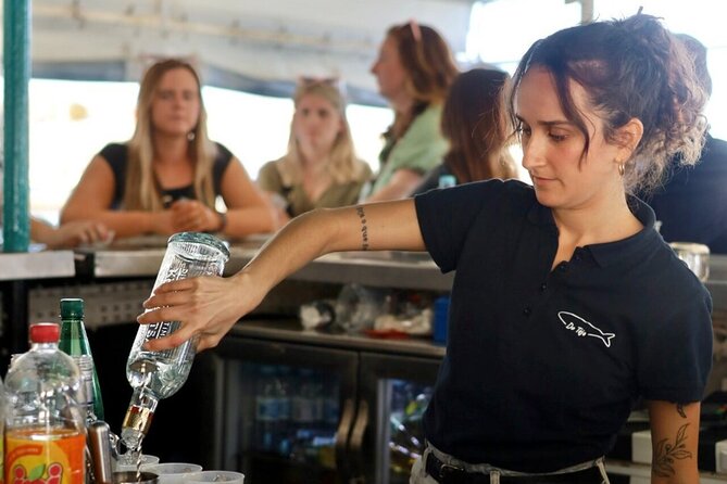 Lisbon: Sunset on Board With Music & Drinks - Meeting and Pickup