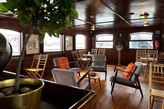 Lisbon: Sunset on Board With Music & Drinks - The Sum Up