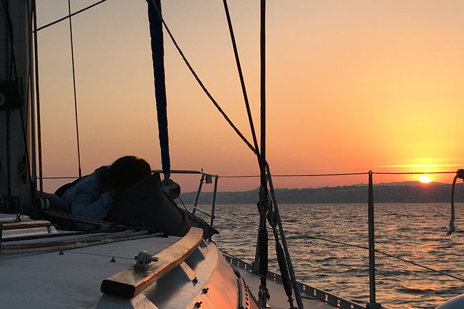 Lisbon Sunset Sensations on a Private Sailing Boat With Wine&Snacks - Intimate and Romantic Ambiance