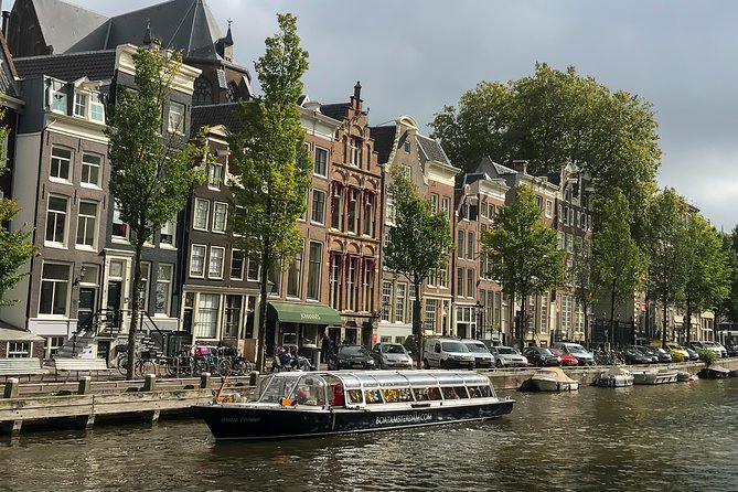 Live Guided Amsterdam Canal Cruise Sightseeing - Discovering Key Landmarks Along the Way