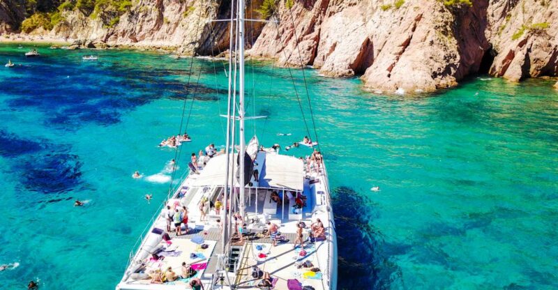 Lloret de Mar: Catamaran Sailing Cruise with BBQ and Drinks - Water Activities and Scenic Highlights