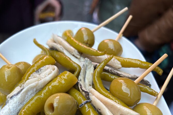 Local Tapas Tour With Private Dinner and Bottomless Wine - Key Points