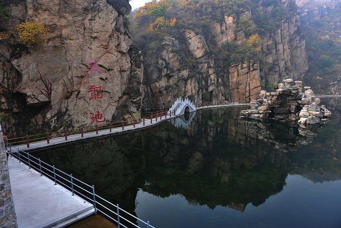 Longqing Gorge and Guyaju Caves Excursion With English Speaking Driver - What Travelers Should Know