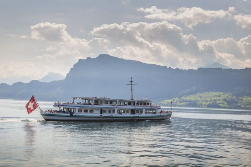 Lucerne: Walking and Boat Tour With Cheese & Wine Tasting - Enjoying the Scenic Boat Trip