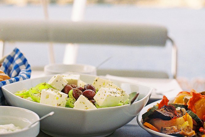 Luxury Catamaran Cruise from Athens with Traditional Greek Meal and BBQ - Views, Snorkeling, and Relaxation