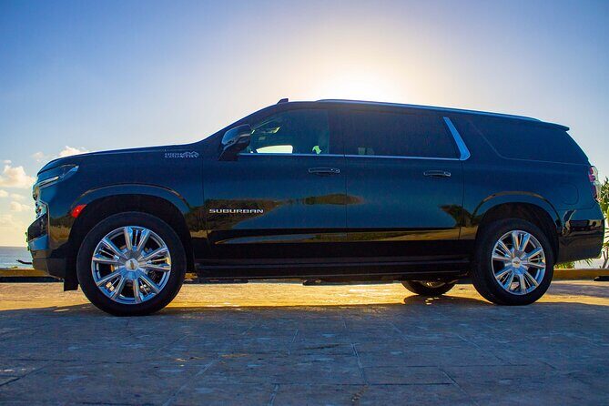 Luxury Suv departures from Costa Mujeres to Cancun Airport - The Sum Up