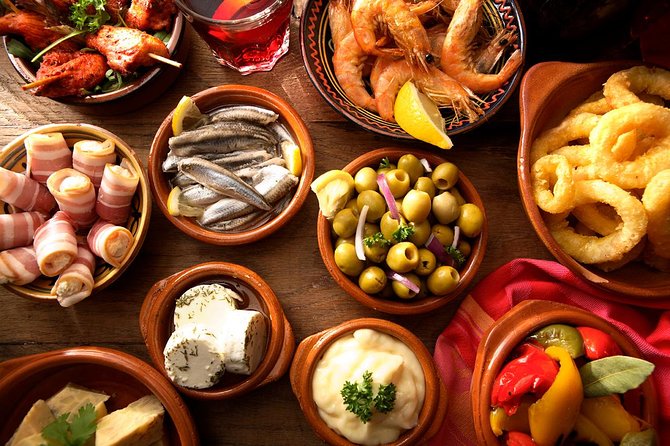 Madrid Tapas Experience Walking Tour - Guide Expertise and Performance
