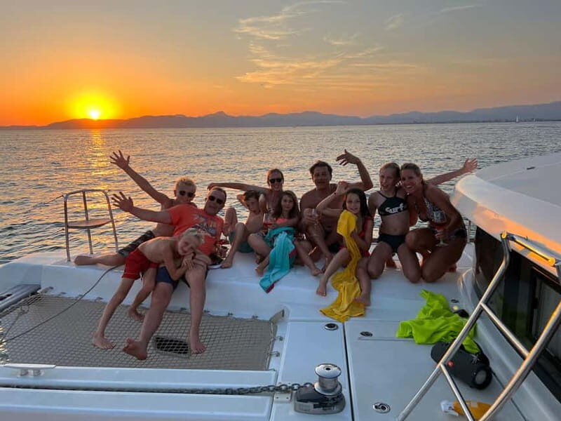 Majorca: Dinner aboard a private catamaran with snorkeling and paddle surfing - The Sum Up