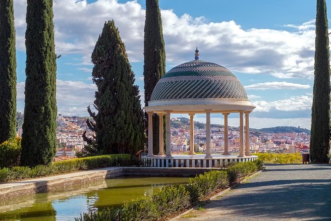 Malaga E-MTB Tour: Botanical Garden, Natural Park and Port of Malaga - Learning About Malagas History and Culture