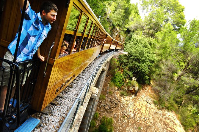Mallorca in One Day Sightseeing Tour With Boat Ride and Vintage Train - Itinerary and Activities