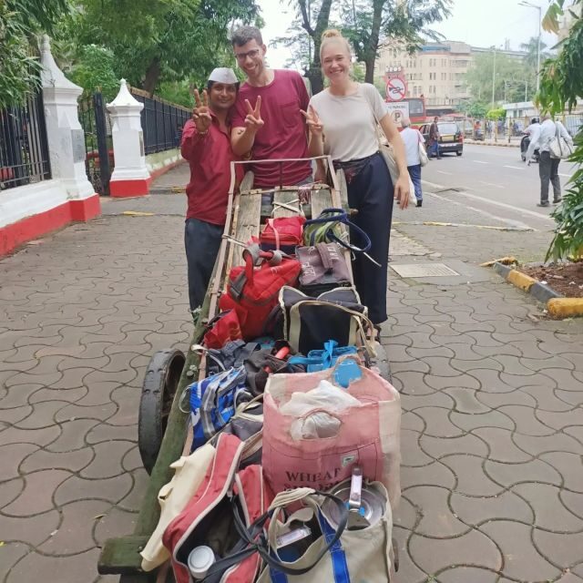 Meet Dabbawala Visit Dhobi Ghat & Dharavi slum with Train - Experiencing Mumbais Daily Life: The Local Train Ride