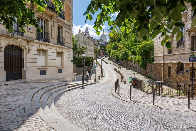 Montmartre Sacre Coeur Tour With Local Guide - Key Points