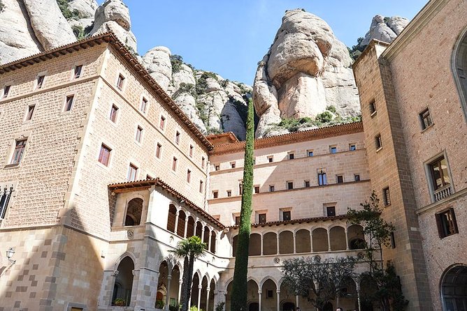 Montserrat 7-Hour Private Tour From Barcelona With Lunch - Exploring the Montserrat Abbey