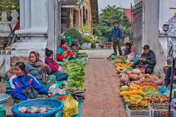 Morning food tour with market Temples option Kuangsi waterfall - Authentic Experiences Highlighted by Travelers