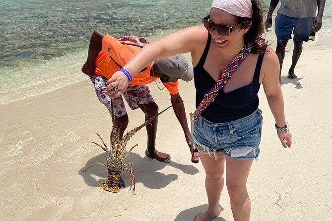 Negril Glass Bottom Boat Tour+Snorkeling visit Booby cay island - Key Points