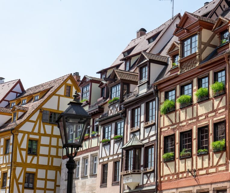Nuremberg: Highlights Walking Tour with Guide - Crossing the Oldest Metal Suspension Bridge