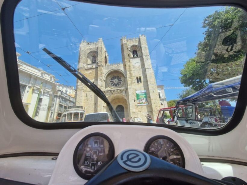 Old town of Lisbon on board of a tuk tuk- 1hour - The Sum Up