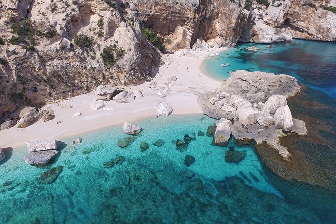 One Day Guided Boat Tour Along the Baunei Coast. - Highlights of the Tour