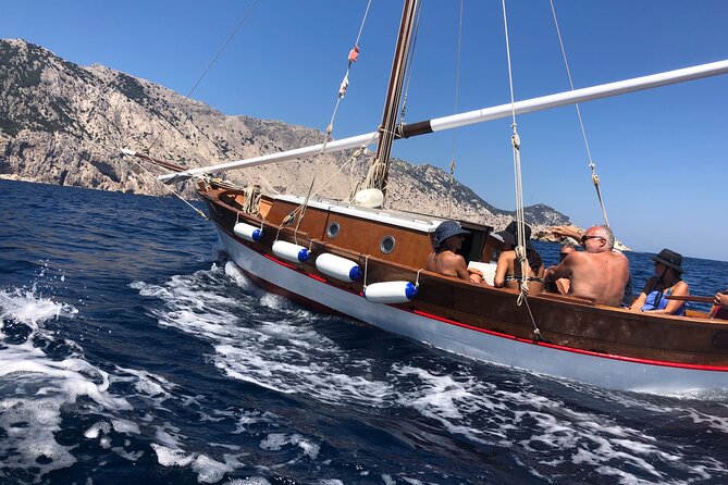 One-day tour on a vintage cruise in Tavolara and Molara - Detailed Breakdown of the Itinerary