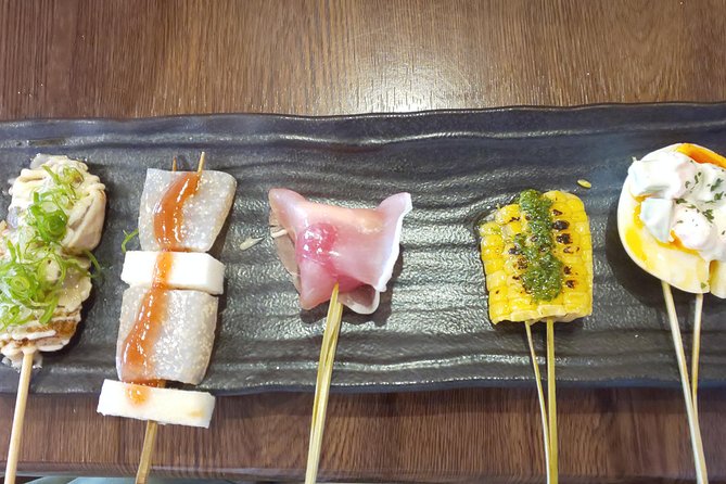 Osaka Food Tour - 13 Delicious Dishes at 5 Local Eateries - Culinary Highlights and Dishes Sampled