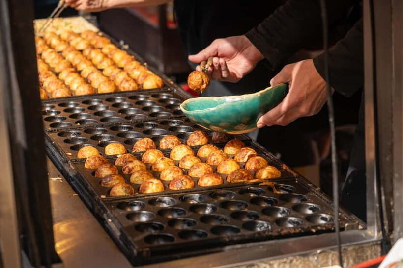 Osaka: Iconic Landmarks and Culinary Gems Private Tour - Dotonbori: Osaka’s Entertainment and Food Hub