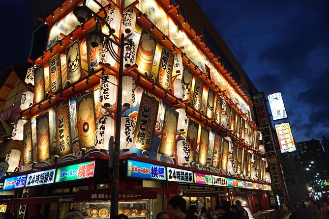 Osaka Local Foodie Walking Tour in Dotonbori and Shinsekai - Indulging in Okonomiyaki and Takoyaki