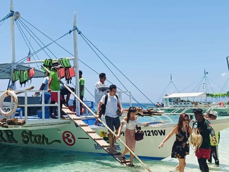 Oslob: Whaleshark Watching, Sumilon Island & Monkey Viewing - Transition to Sumilon Island: Sun, Sand, and Snorkeling