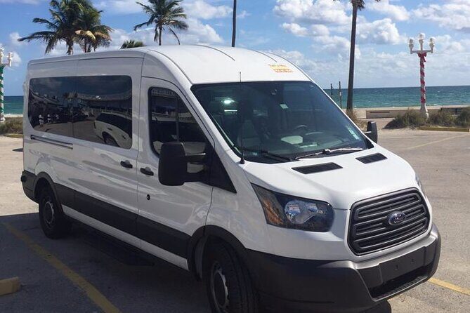 Owen Roberts Airport (GCM) to George Town - Round-Trip Transfer - The Sum Up