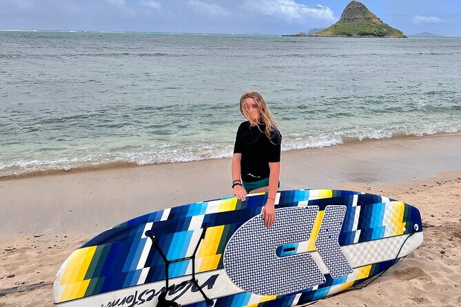 Paddle boarding and hiking adventure at Mokoli'i Island. - The Sum Up