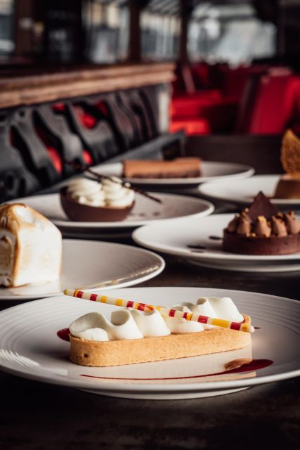 Paris: 4-Course Dinner Cruise on Seine River with Live Music - Dining: French Cuisine on the Water